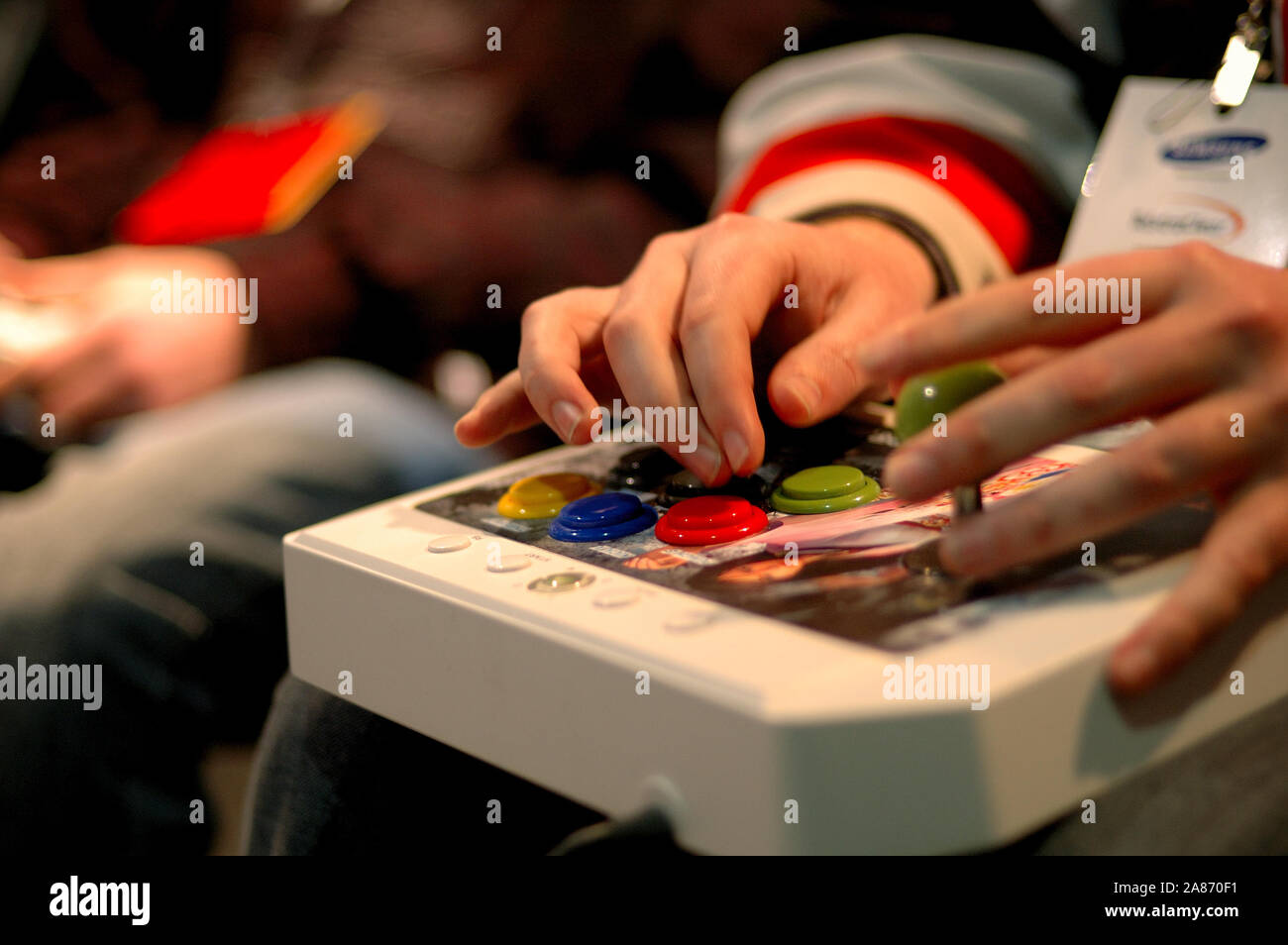 gamers competing in cyber games using computers, gaming consoles and ...