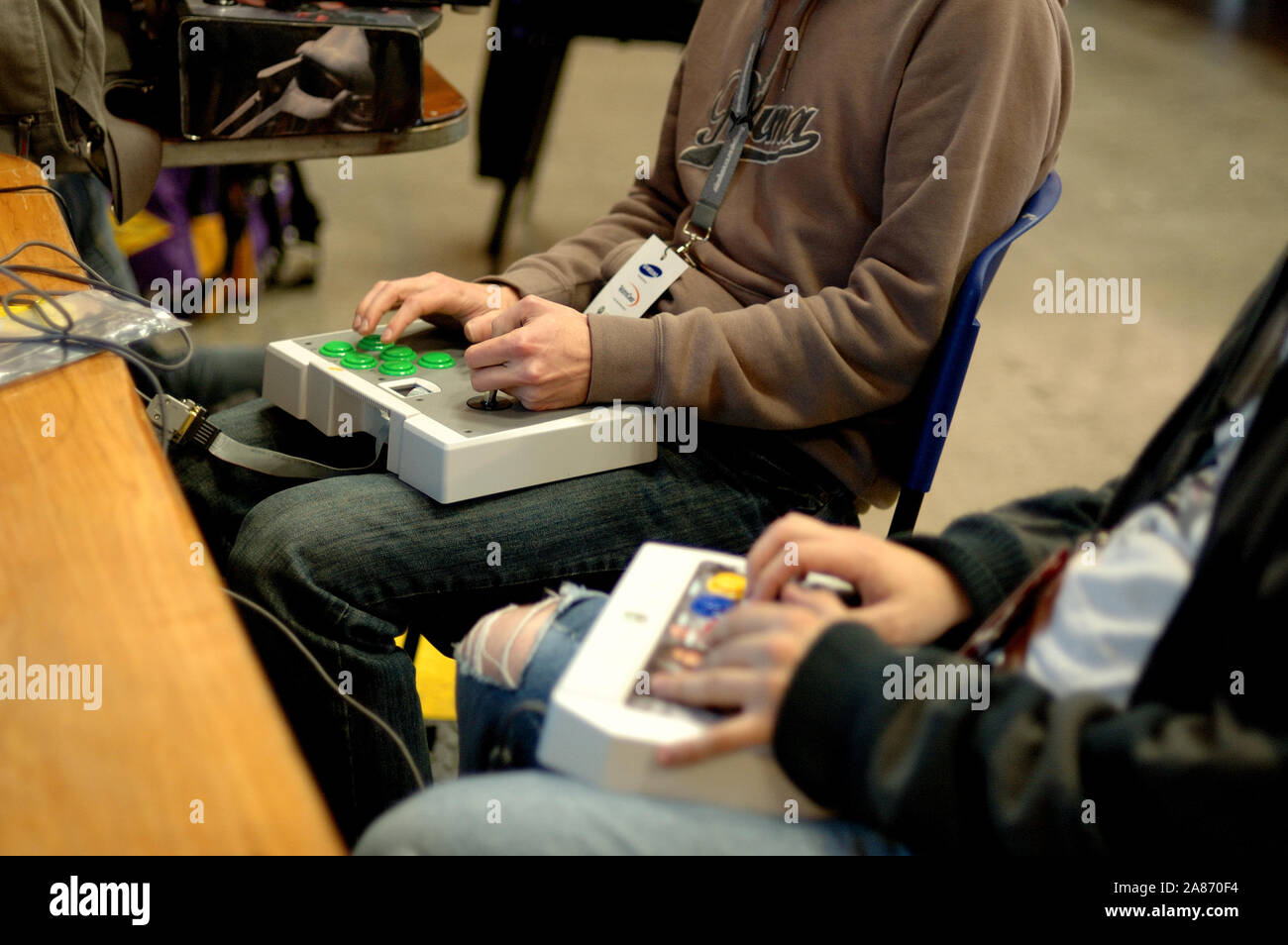 gamers competing in cyber games using computers, gaming consoles and ...