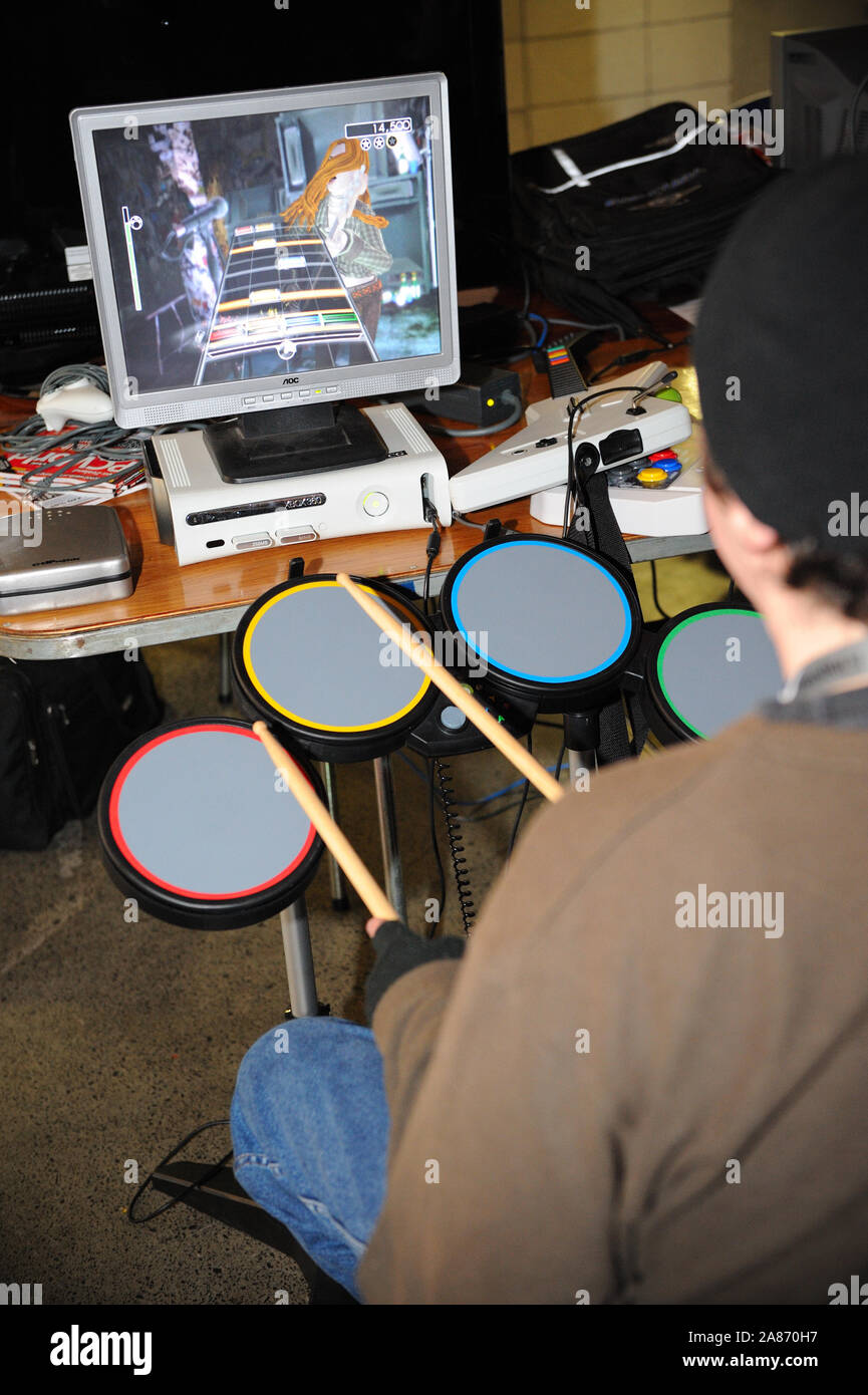 gamers competing in cyber games using computers, gaming consoles and ...