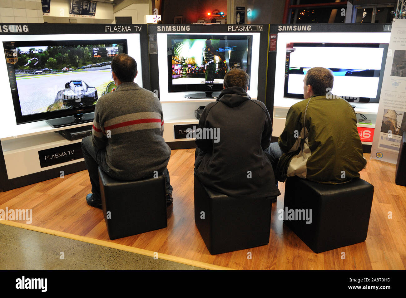 gamers competing in cyber games using computers, gaming consoles and ...