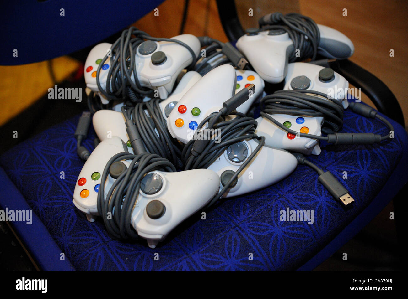 gamers competing in cyber games using computers, gaming consoles and ...