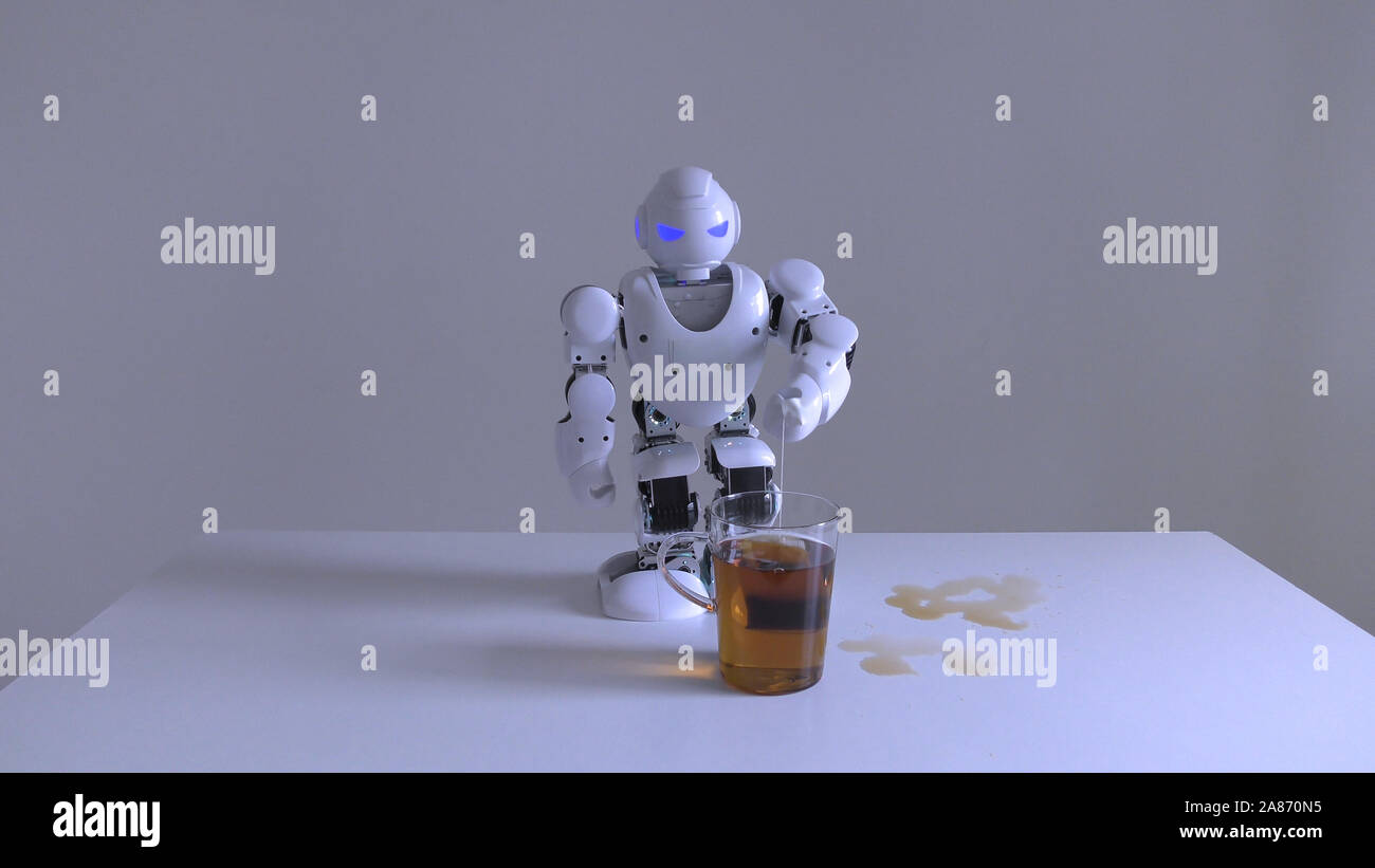 A domestic android humanoid robot helps brewing tea for his master by ...