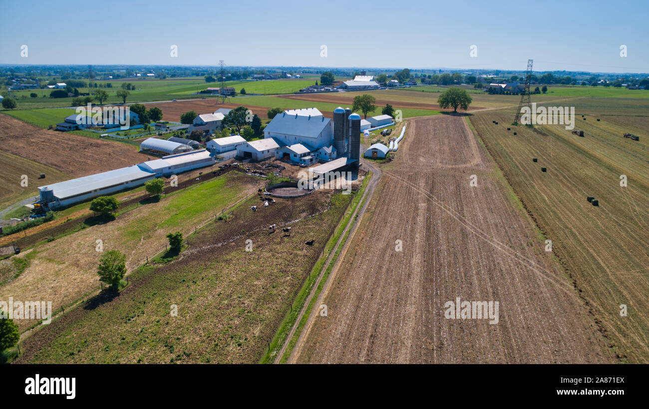Aerial View of Amish Farm Harvest Rolled Crops ready for Storage on a ...