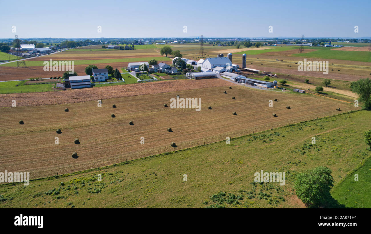 Aerial View of Amish Farm Harvest Rolled Crops ready for Storage on a ...