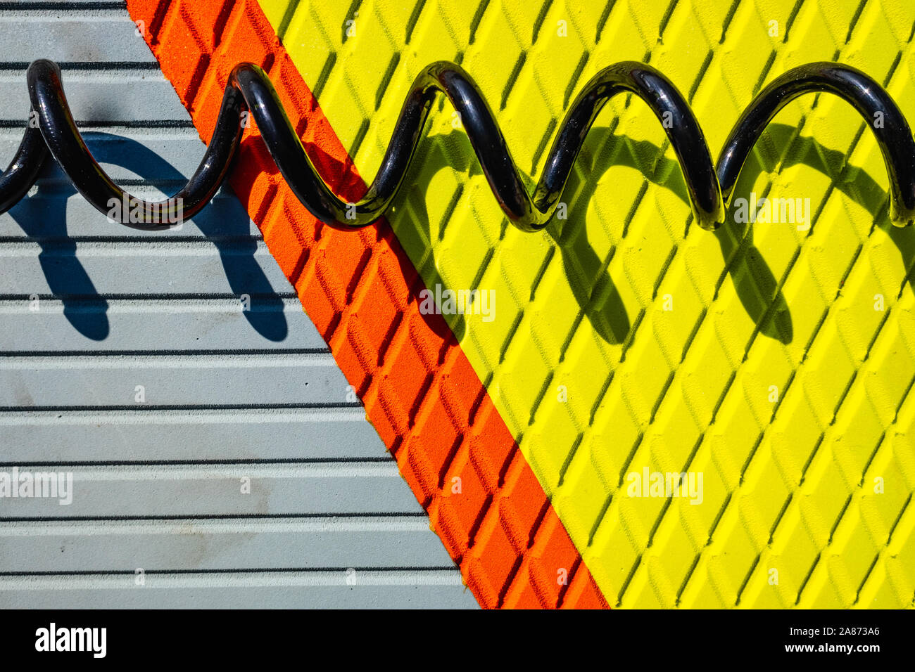 Wavy cable on a solid colored foam background Stock Photo - Alamy