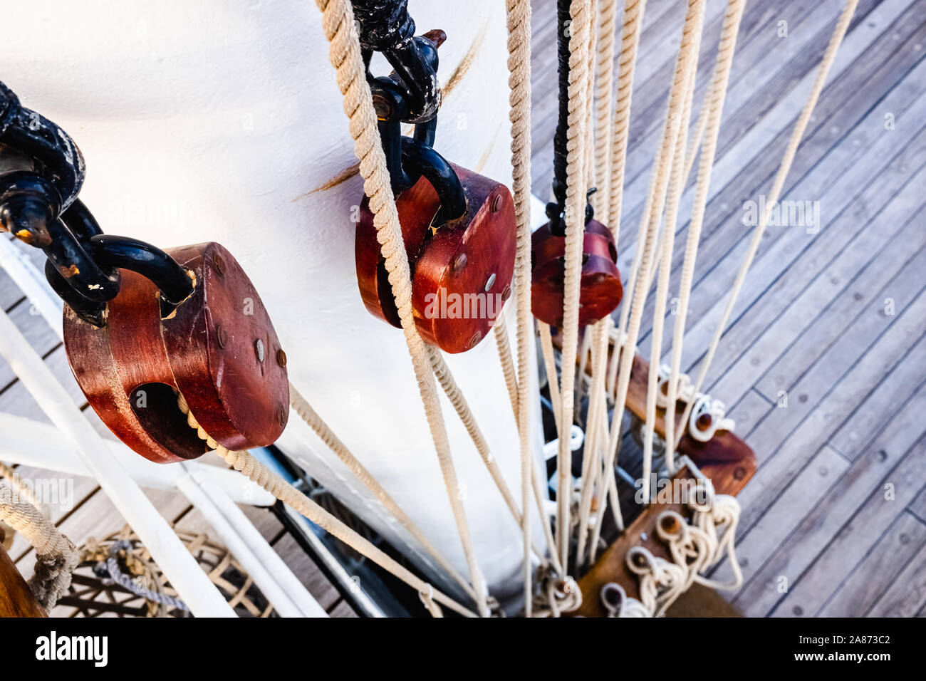 Ship ropes tied to the mast before lowering sails Stock Photo - Alamy
