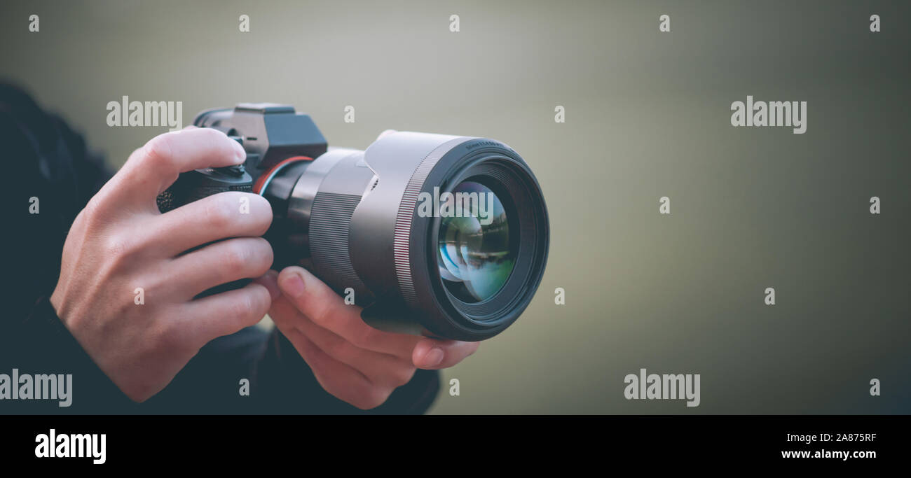 Man taking picture with photo camera, modern technology, close-up Stock ...