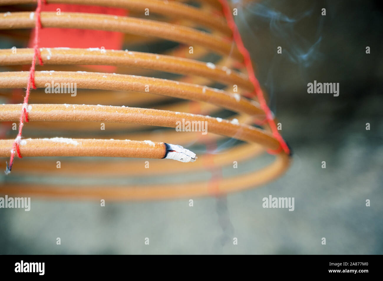 Burned coil swirl incense in Macau (Macao) temple, traditional Chinese ...