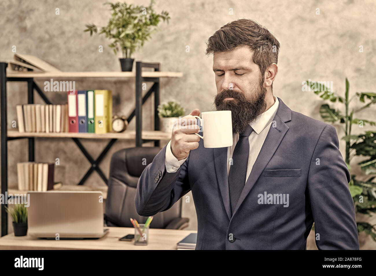 Drinking coffee relaxing break. Boss enjoying energy drink. Start day ...