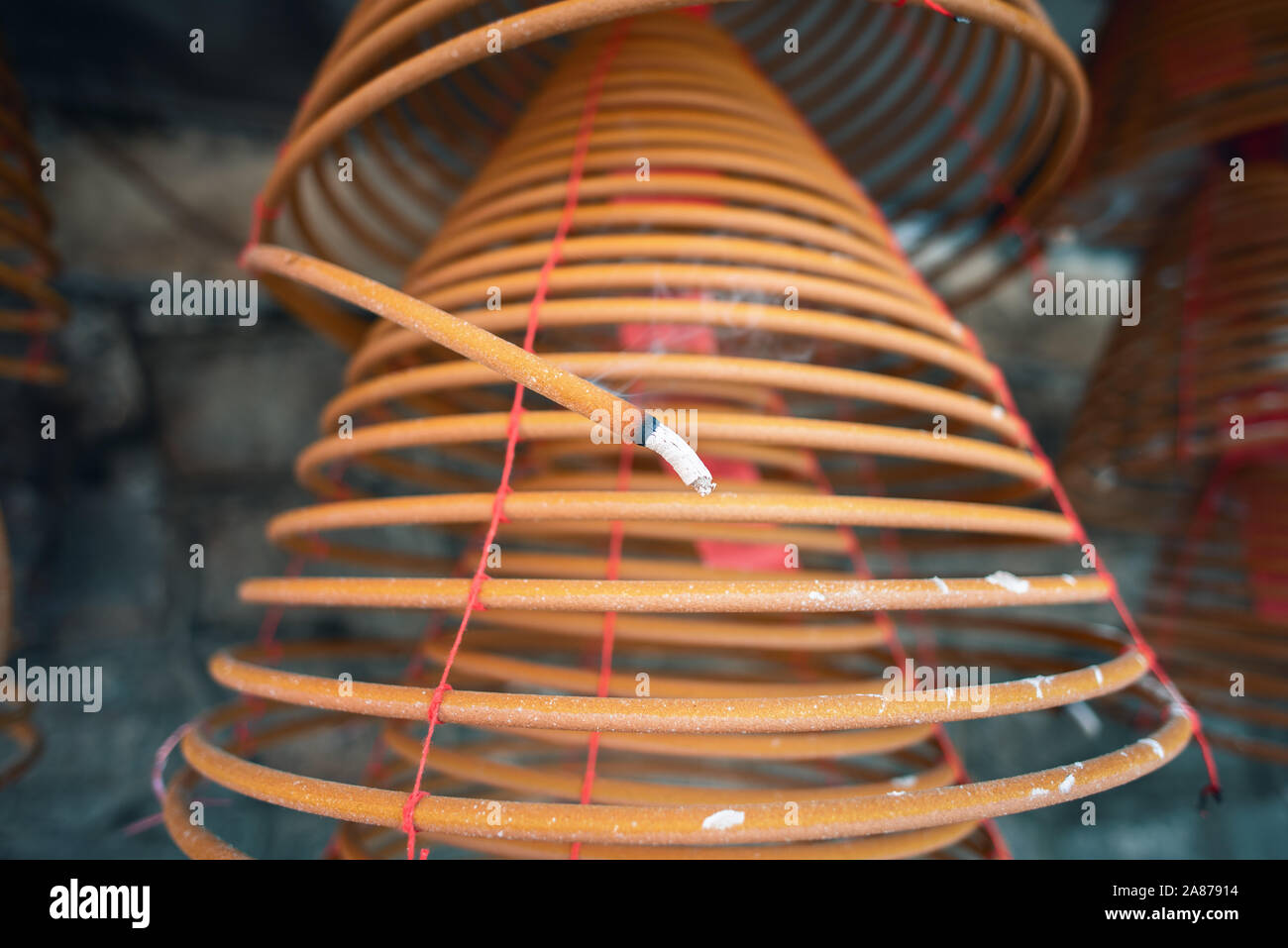 Burned coil swirl incense in Macau (Macao) temple, traditional Chinese ...