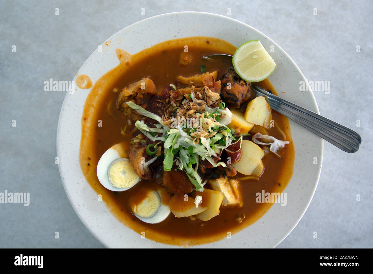 A dish of mee rebus curry noodles at Cathay Mee Stall in the New Town ...