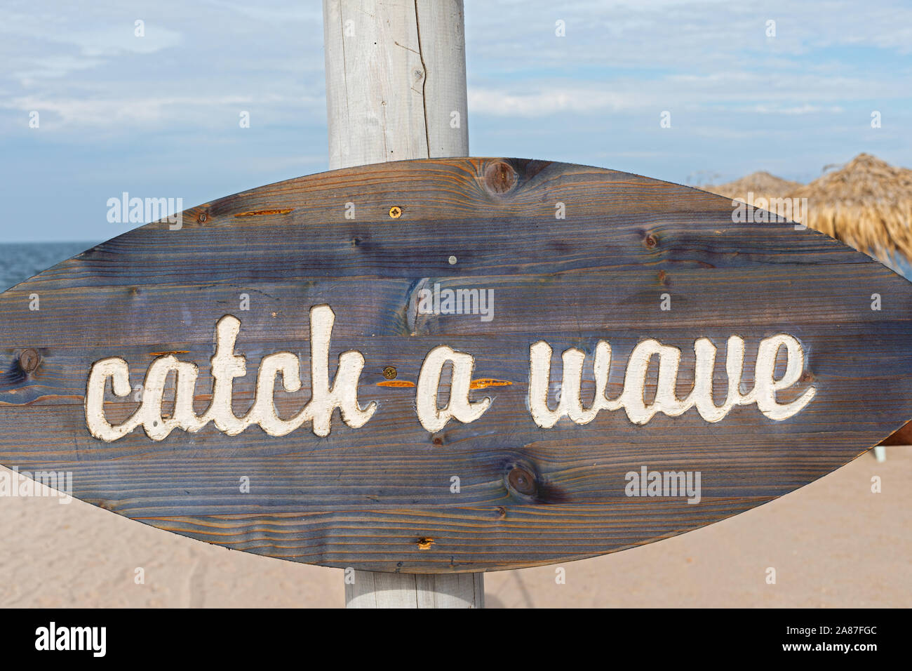 Quotes on wooden colorful signs at Vama Veche beach, Romania Stock ...