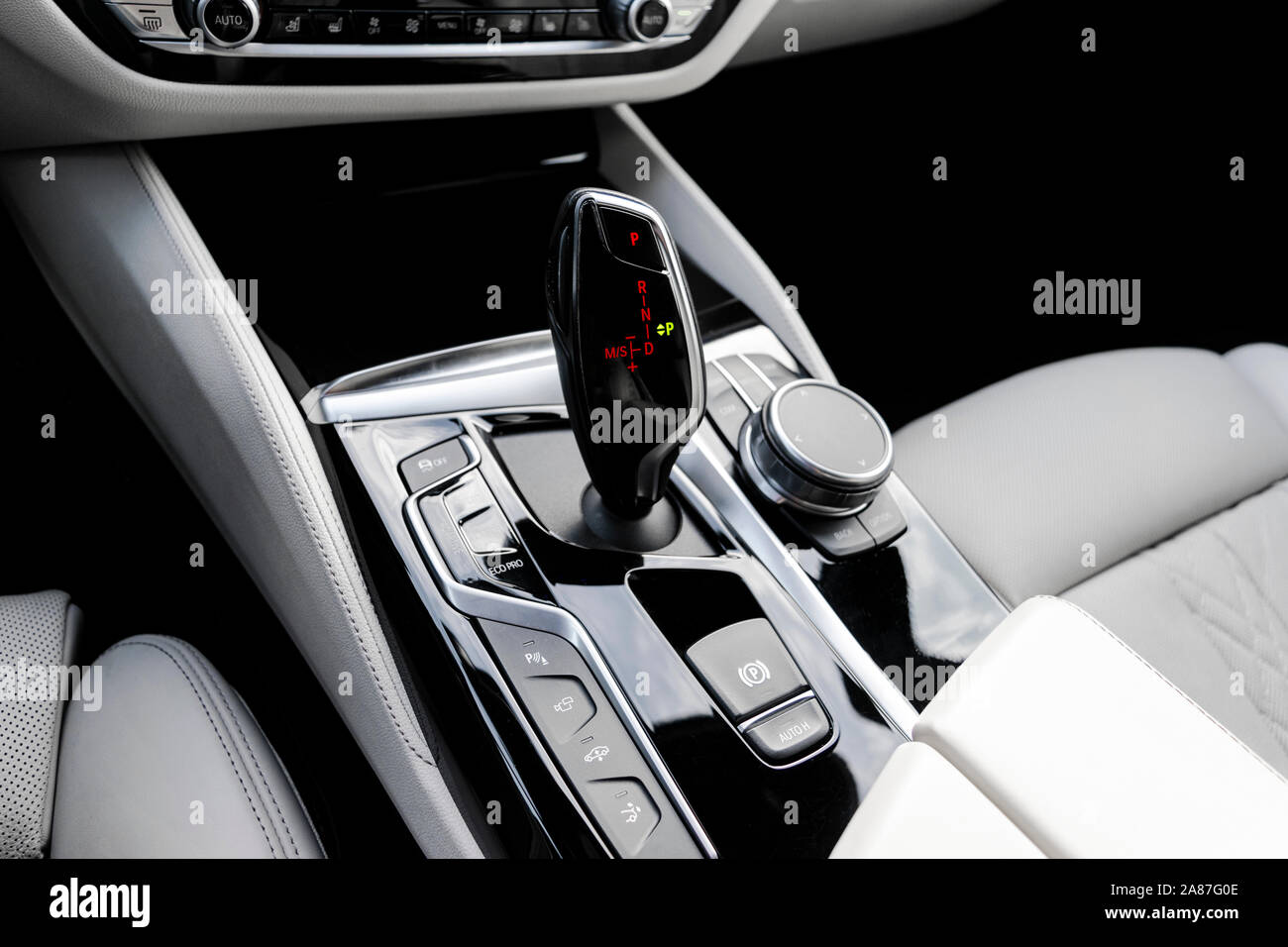 Automatic gear stick of a modern car. Modern car interior details ...