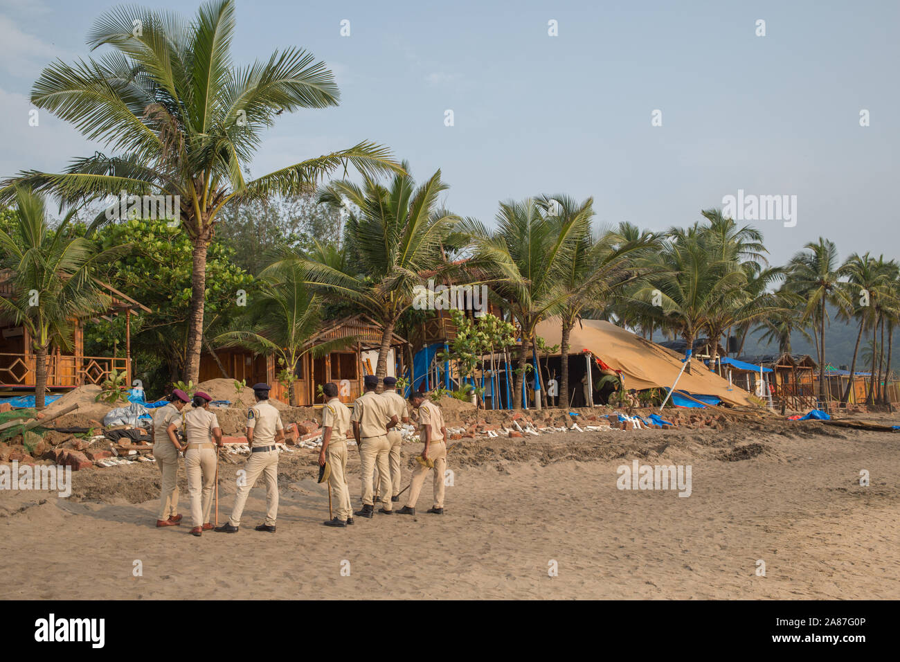 Indian police overseeing demolition of alleged illegal shacks and ...
