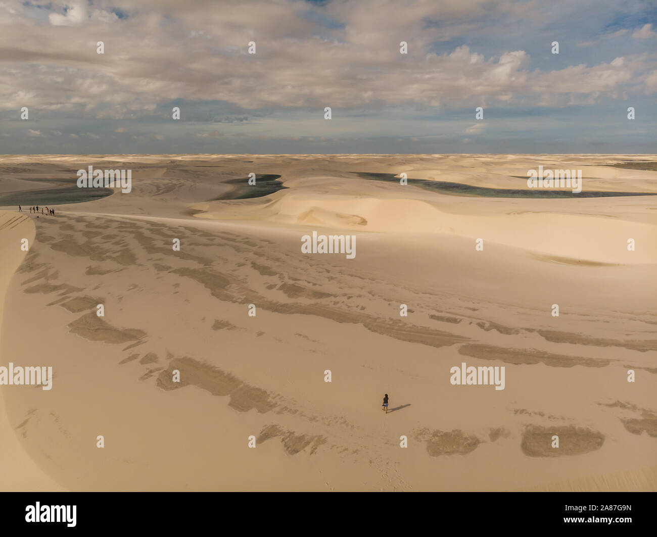 Aerial shot of the sand dunes and lagoons in Brazil, Lencois ...