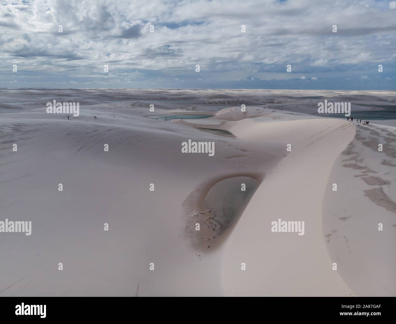 Aerial shot of the sand dunes and lagoons in Brazil, Lencois ...