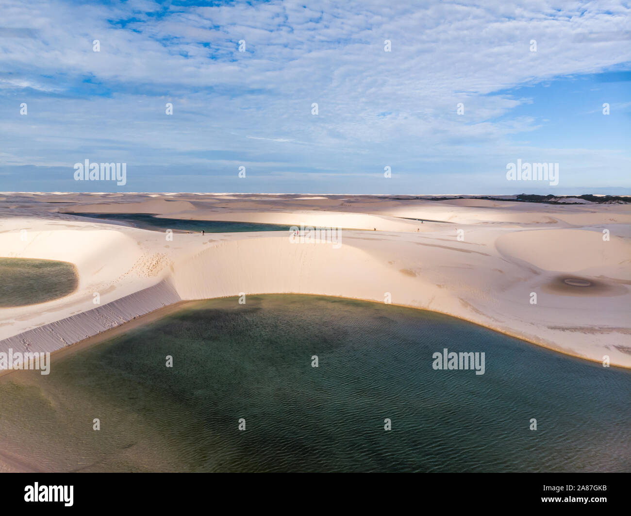 Aerial shot of the sand dunes and lagoons in Brazil, Lencois ...