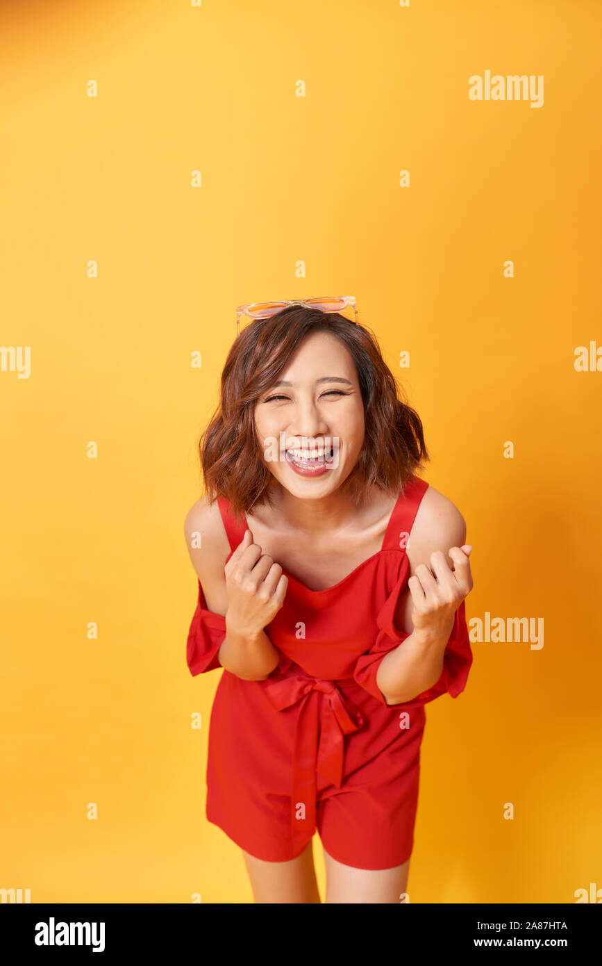 Emotional Positive Girl Posing On Yellow Background Good Looking Young