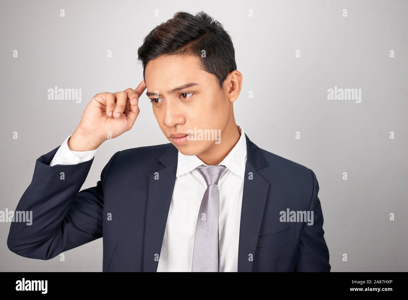 Man scratching head in office hi-res stock photography and images - Alamy