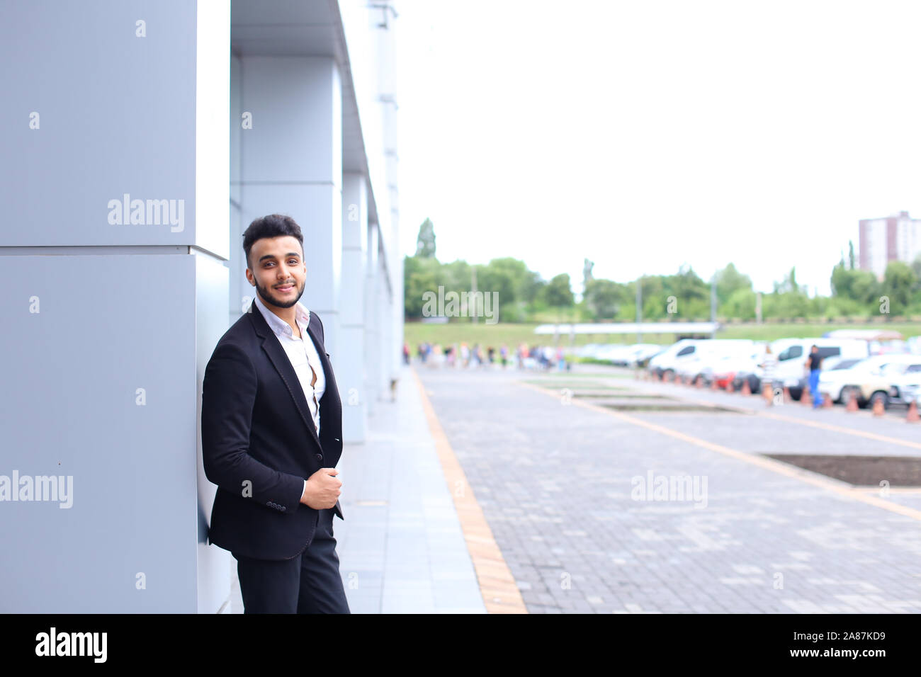 Arab looking young man walking business hi-res stock photography and ...