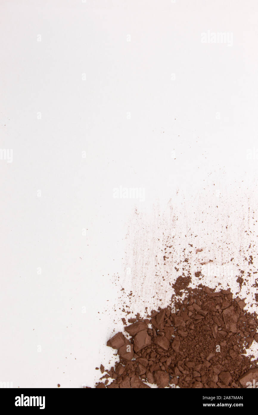 This is a photograph of a Dark Brown Powder Eye shadow isolated on a ...