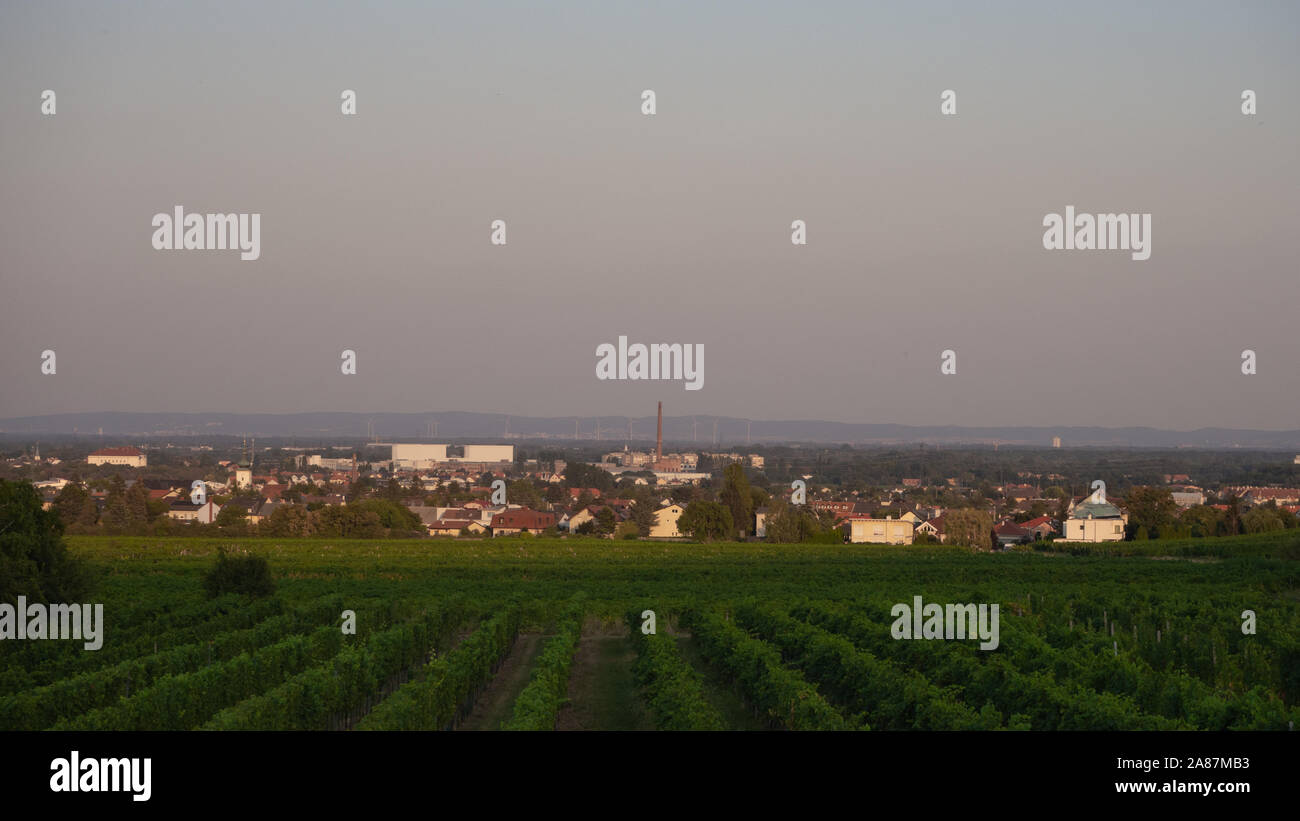 Cityscape with moody sunset sky hi-res stock photography and images - Alamy