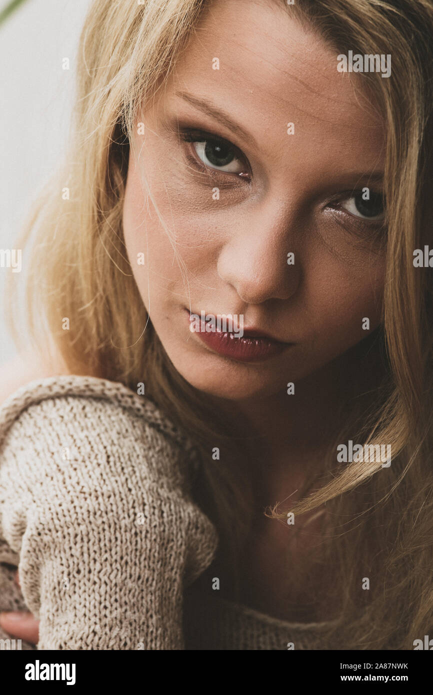 The portrait of sad woman looking at camera. Female depression Stock ...