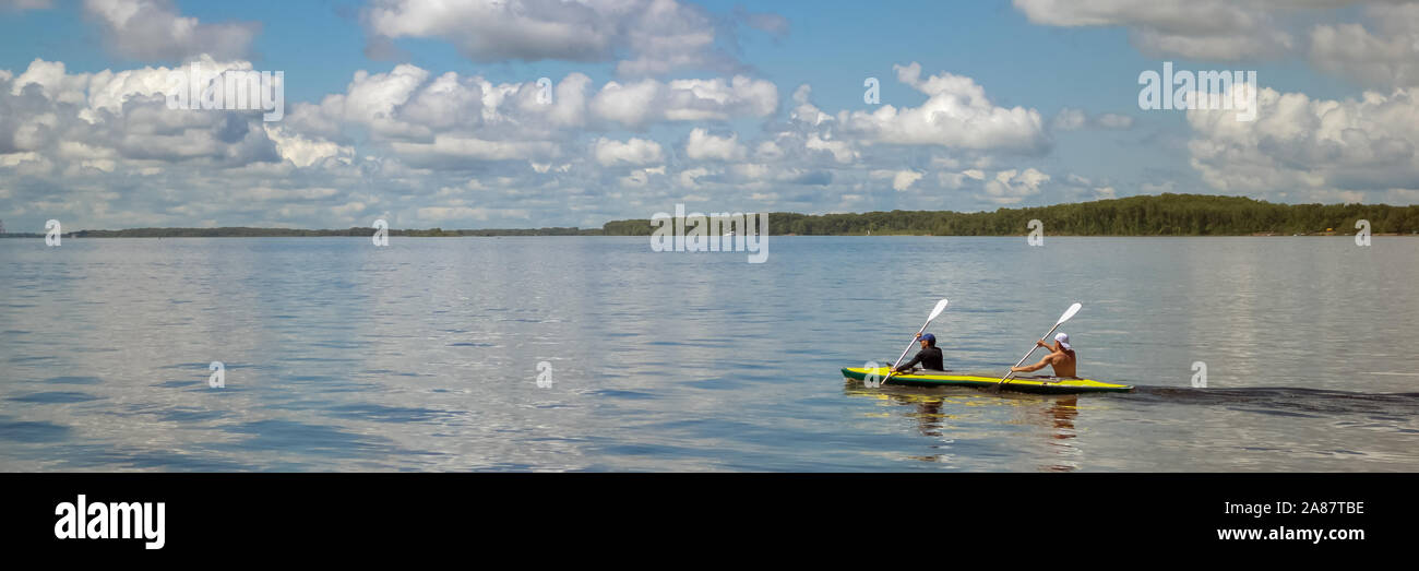2017-06-12 Samara, Russia. Two rowers in a canoe kayak boat floating on ...