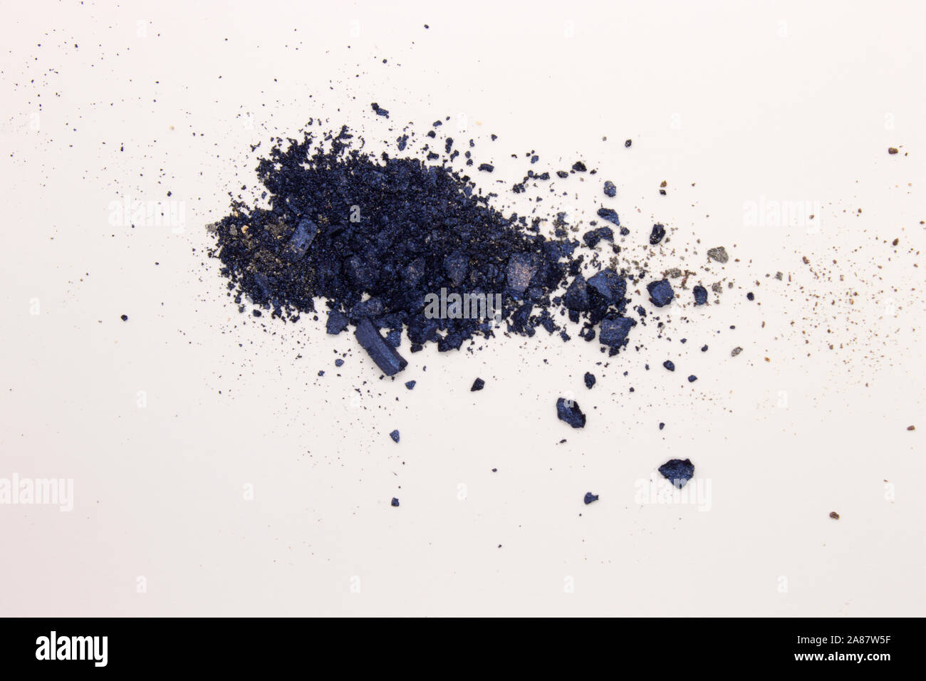 This is a photograph of Shimmery Royal Blue powder Eye shadow isolated ...