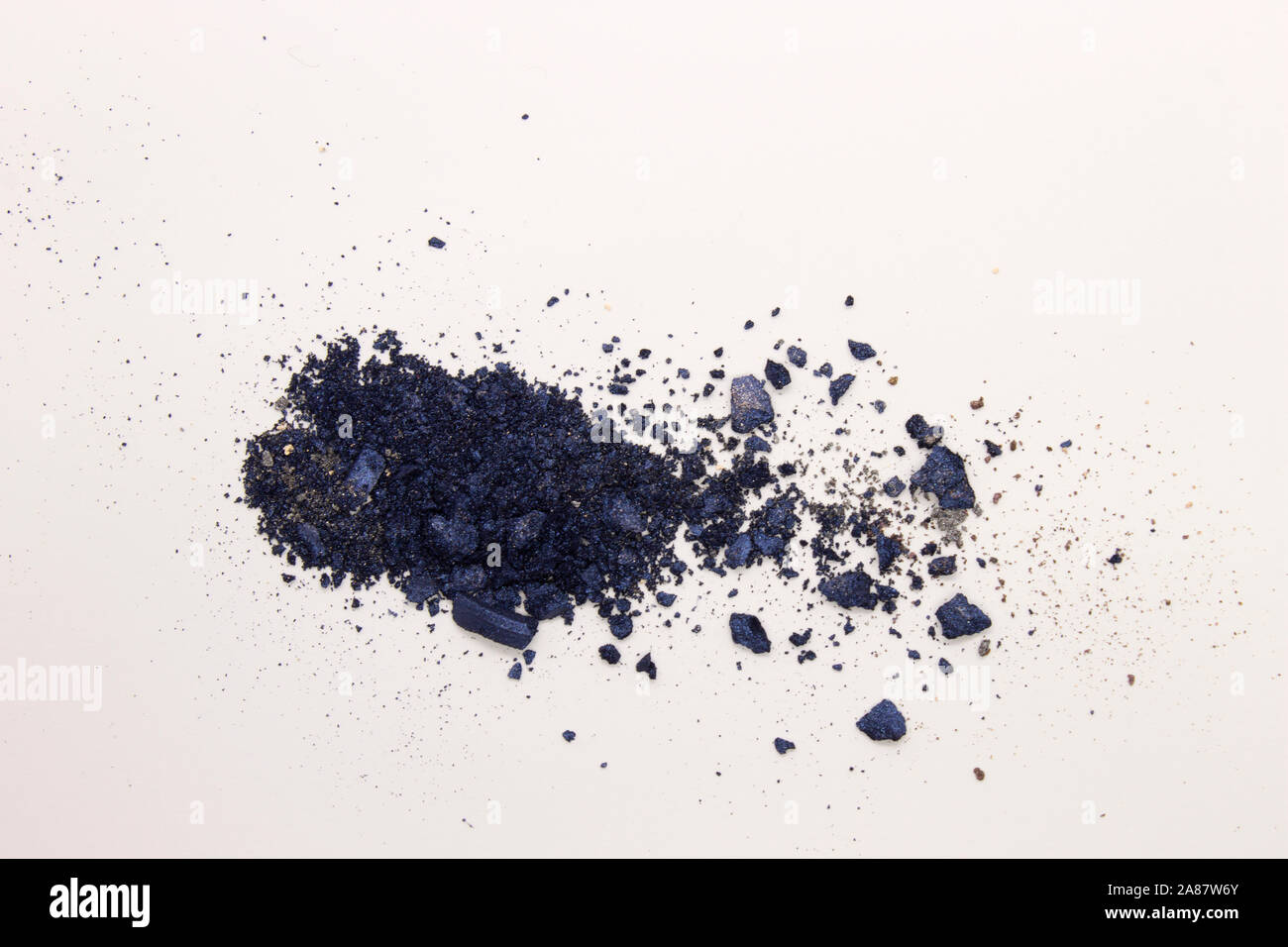 This is a photograph of Shimmery Royal Blue powder Eye shadow isolated ...