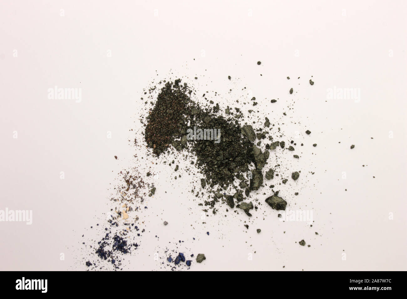 This is a photograph of Olive Green powder Eye shadow isolated on a ...