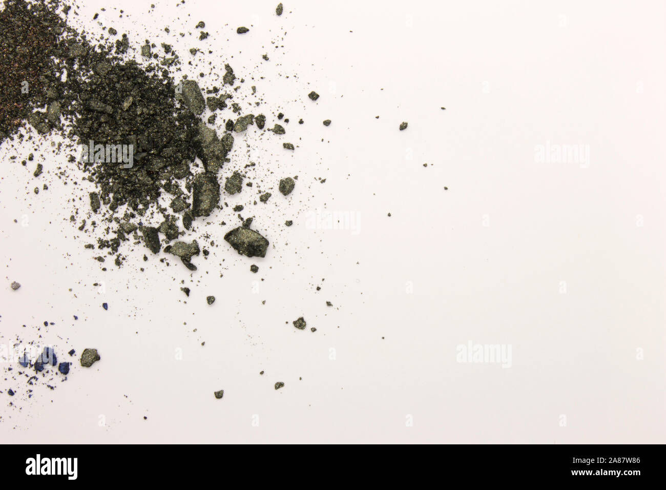 This is a photograph of Olive Green powder Eye shadow isolated on a ...