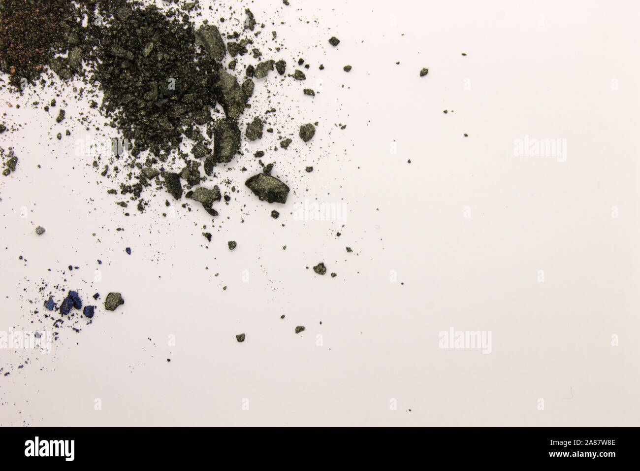 This is a photograph of Olive Green powder Eye shadow isolated on a ...