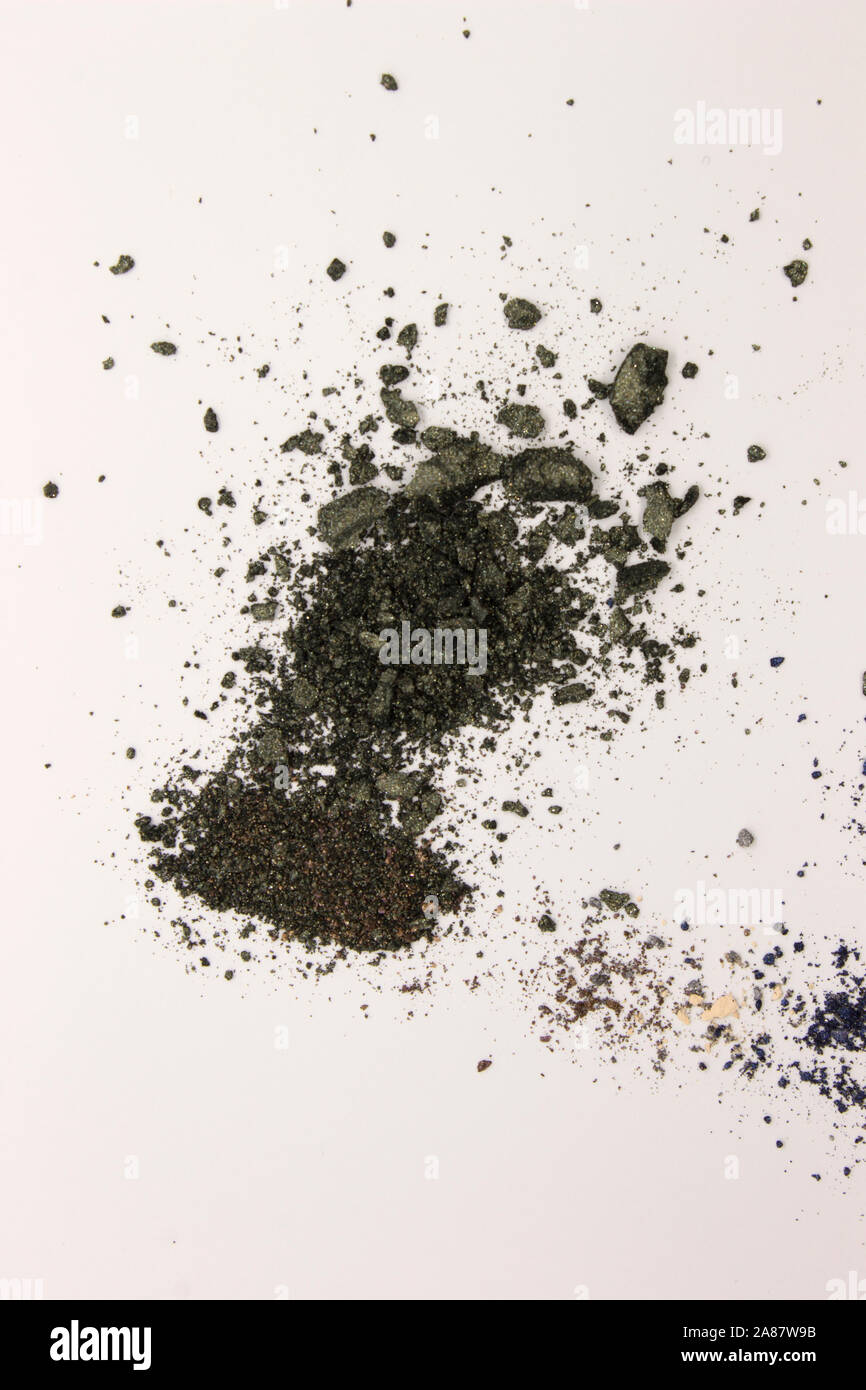 This is a photograph of Olive Green powder Eye shadow isolated on a ...