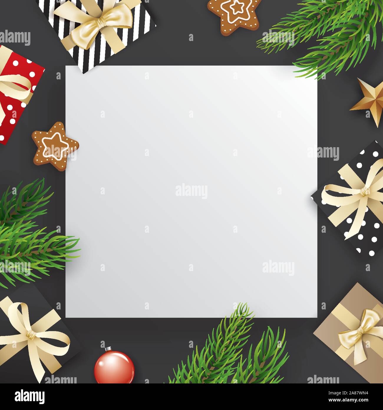 Christmas tree branches and gift box with white space for text ...