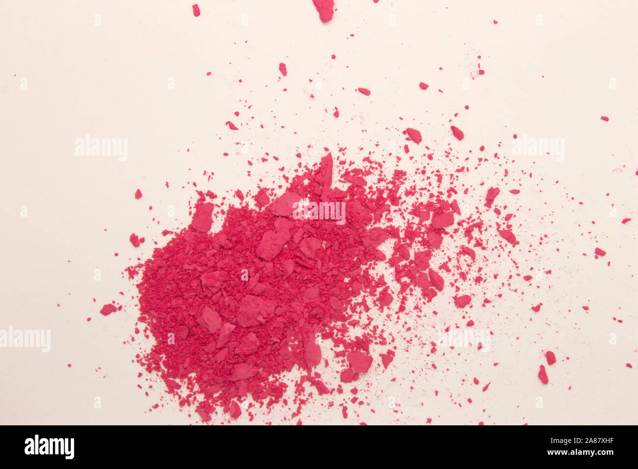 This is a photograph of Fuschia Pink powder Blusher isolated on a White ...