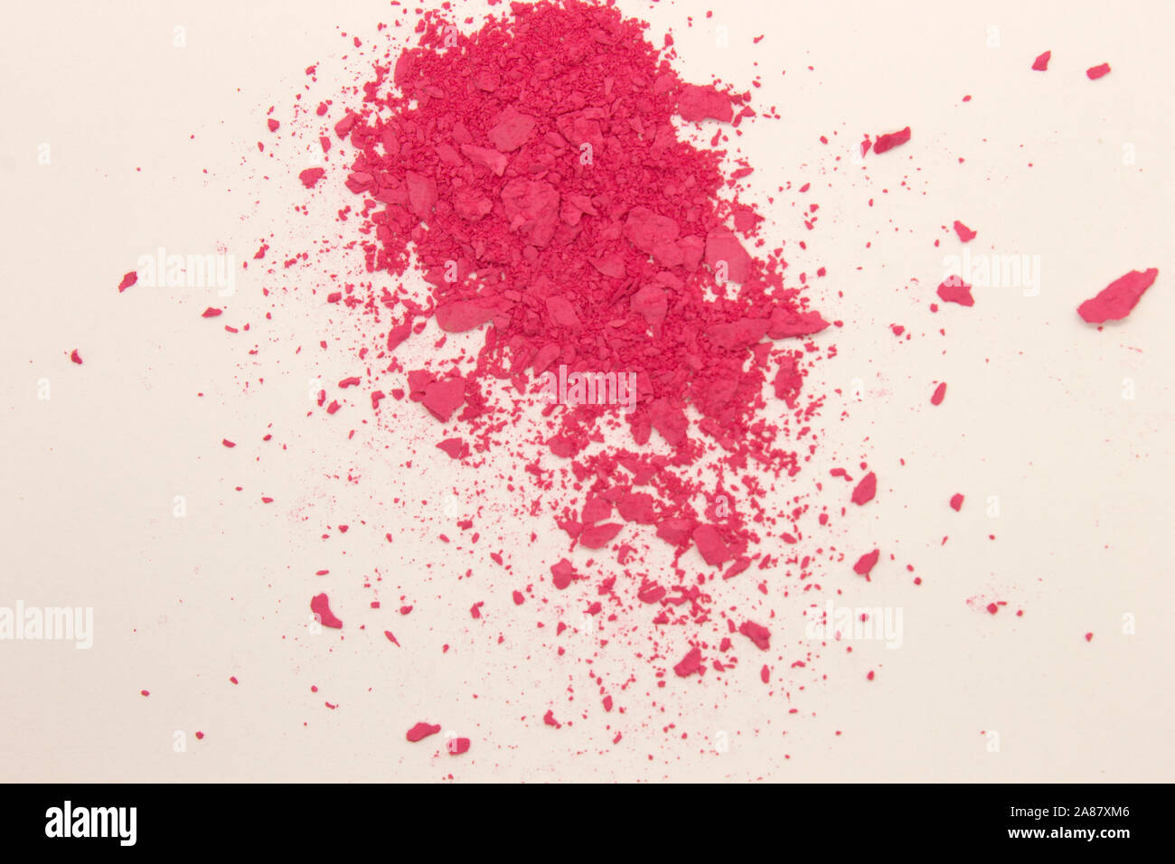 This is a photograph of Fuschia Pink powder Blusher isolated on a White ...