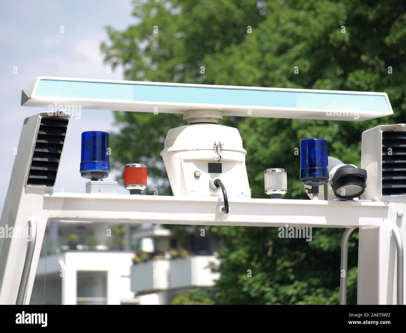 light installations and radar of a small police boat Stock Photo - Alamy