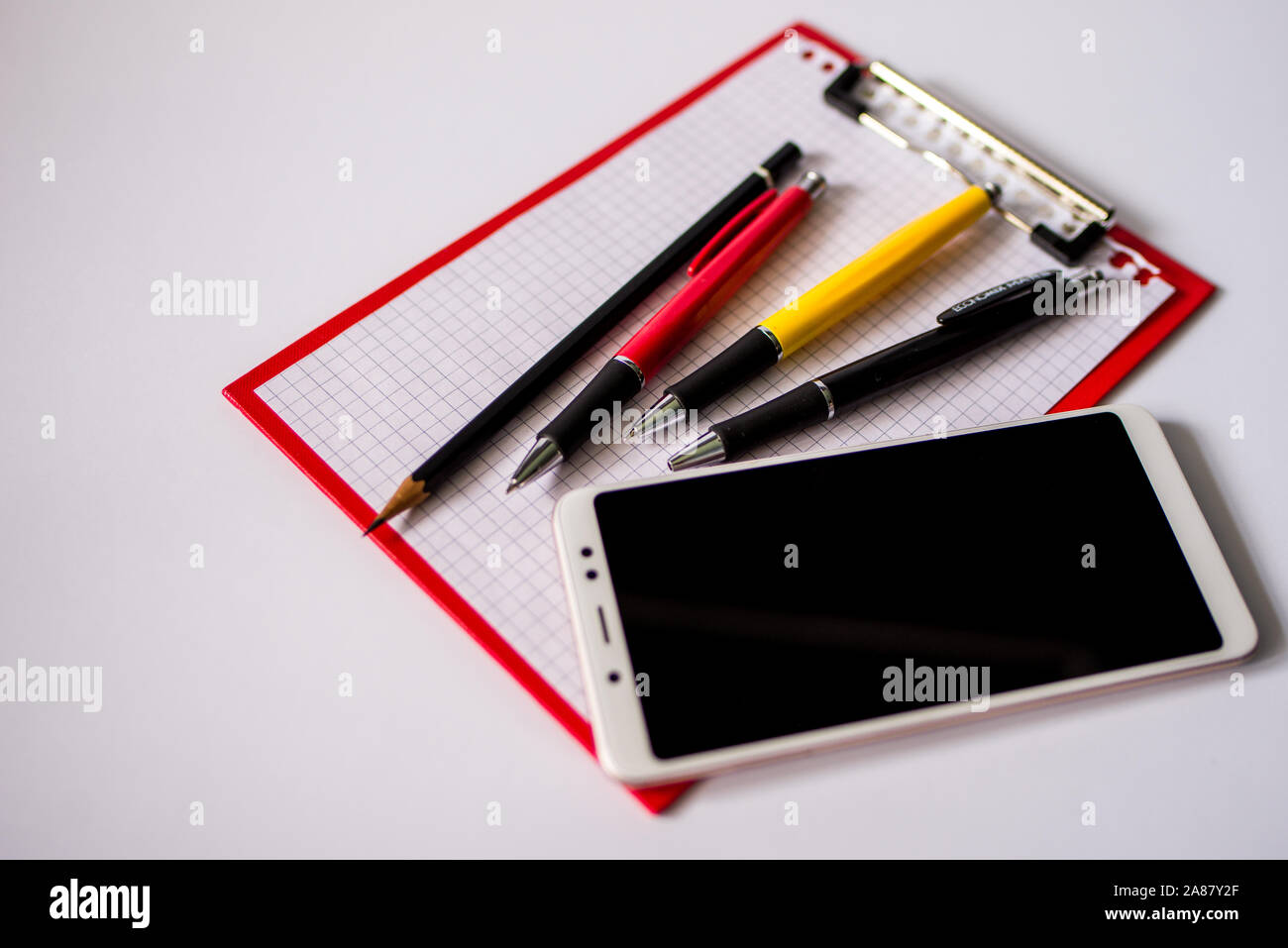 notebook and pen isolated on white background Stock Photo - Alamy