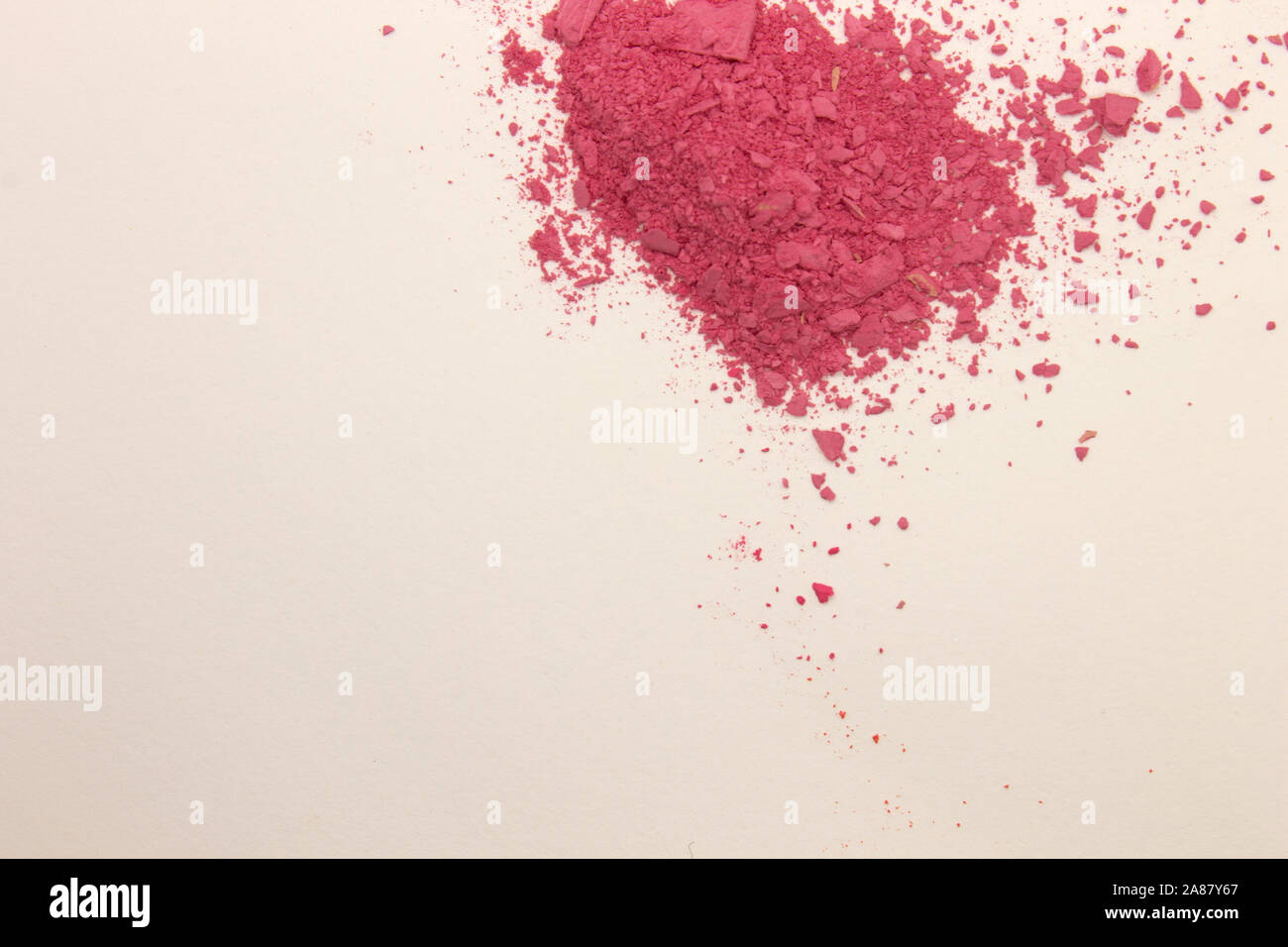 This is a photograph of Pink powder Blusher isolated on a White ...