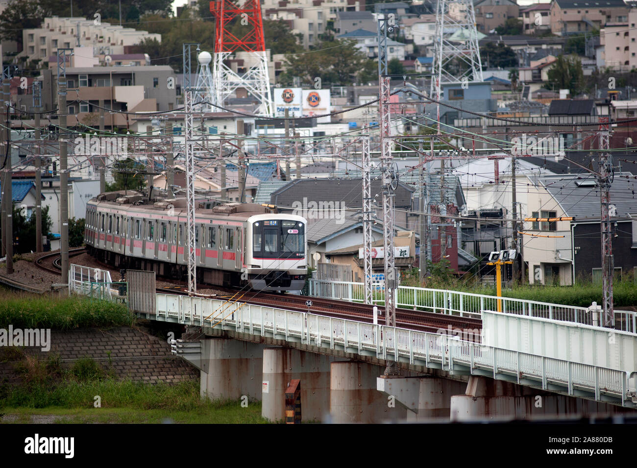 Commuter train approaching Tsunashima, heading to Yokohama, Japan, Asia ...