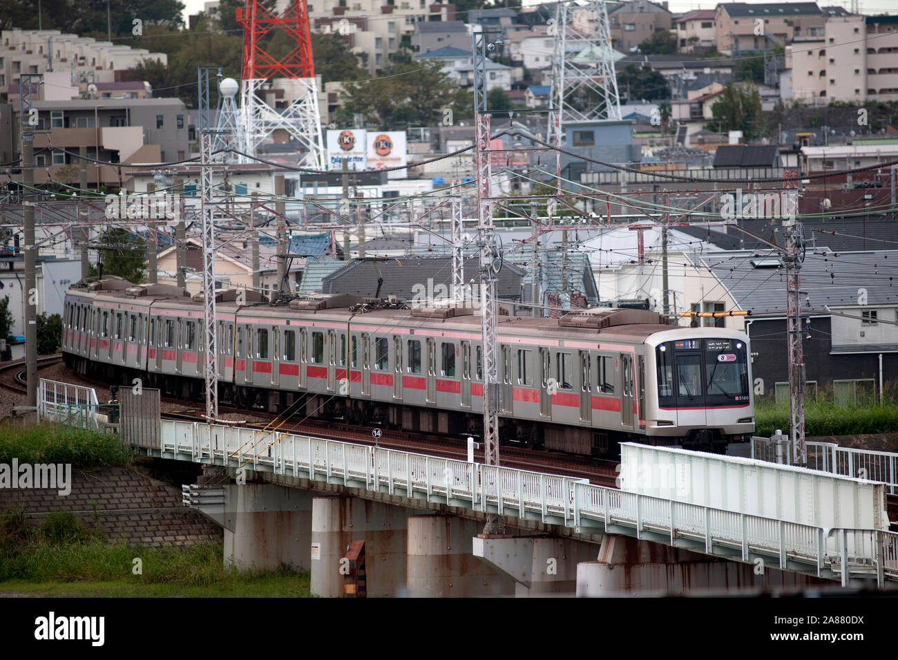 Commuter train approaching Tsunashima, heading to Yokohama, Japan, Asia ...