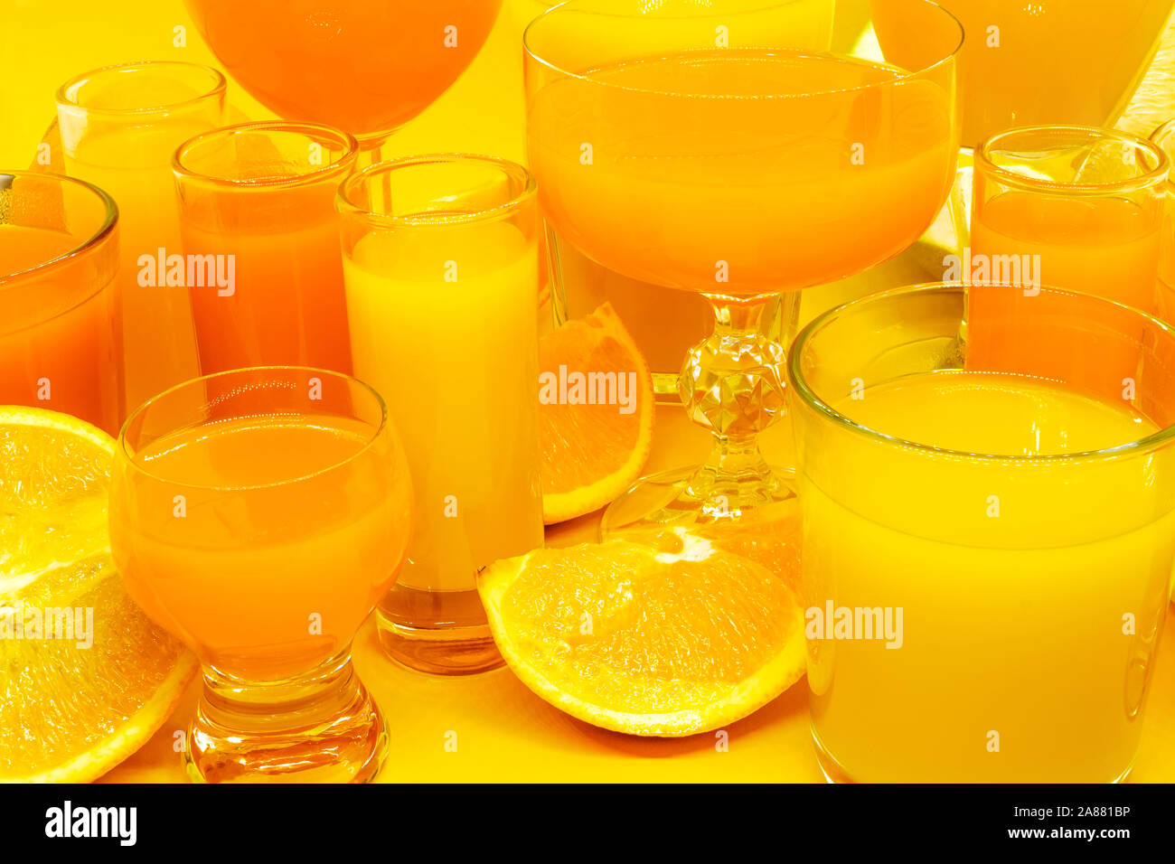 Abstract composition of orange and yellow juices drinks in various ...
