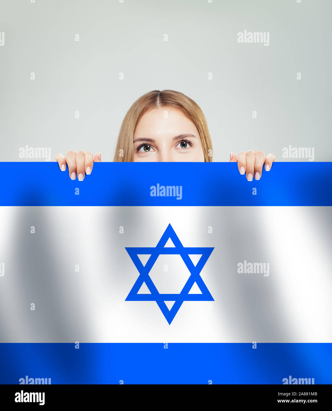 Beautiful happy young woman with Israel flag background. Live ...