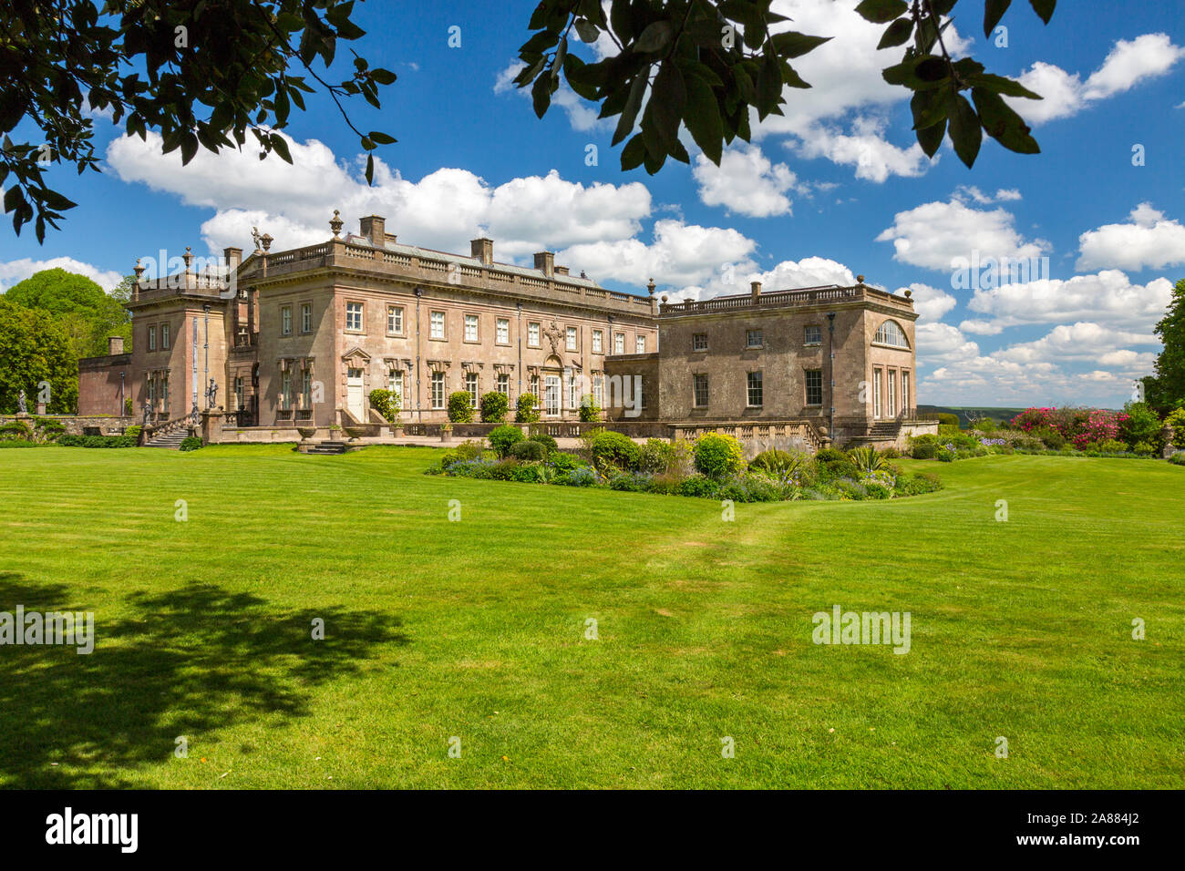 The outside of Stourhead House is surrounded by lawns and colourful ...
