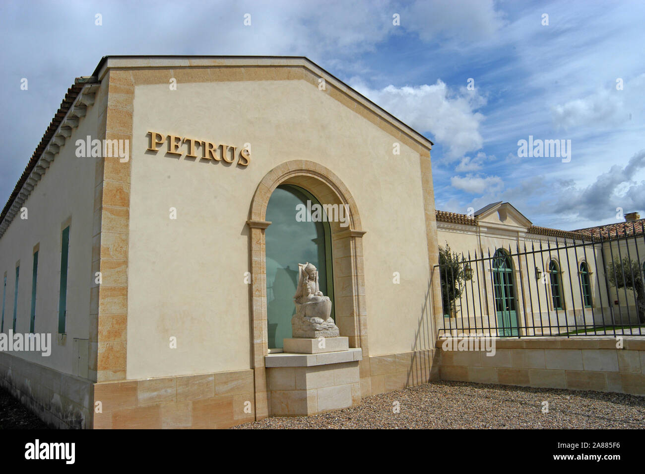 The Chateau Petrus wine estate, with statue of St Pierre, at Pomerol in ...