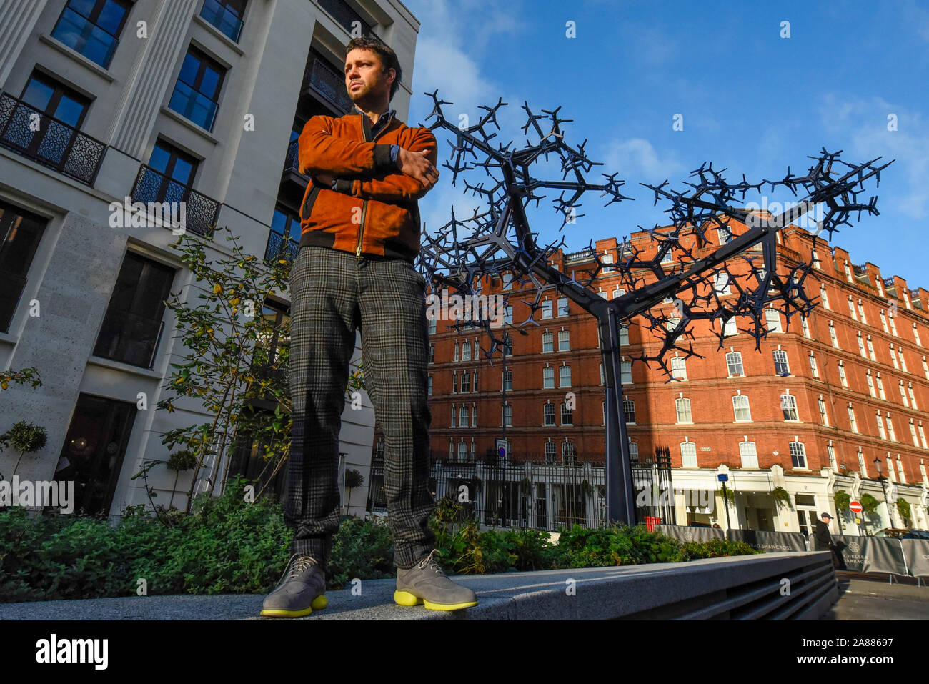 London, UK. 7 November 2019. Conrad Shawcross RA poses next to his new ...