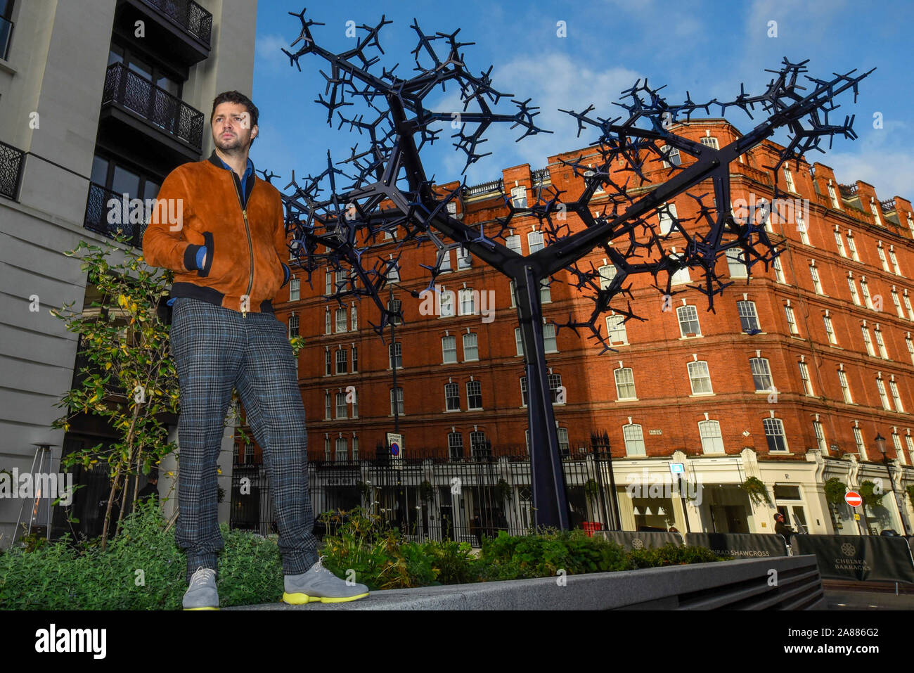 London, UK. 7 November 2019. Conrad Shawcross RA poses next to his new ...