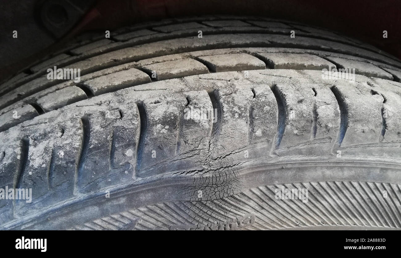 a bump on the tire, damage on the wheel Stock Photo - Alamy