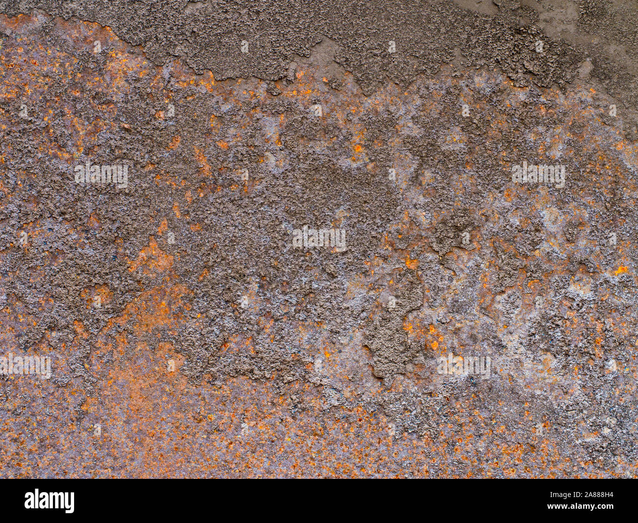 Old brown rusty metal plate is aged and corroded. metallic background ...